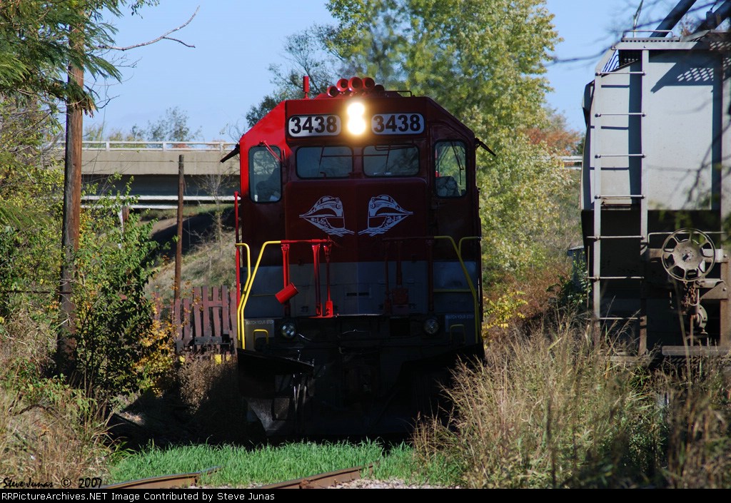 RJCC 3438 pulls up the rear as 1807,1605 pull it to the yard